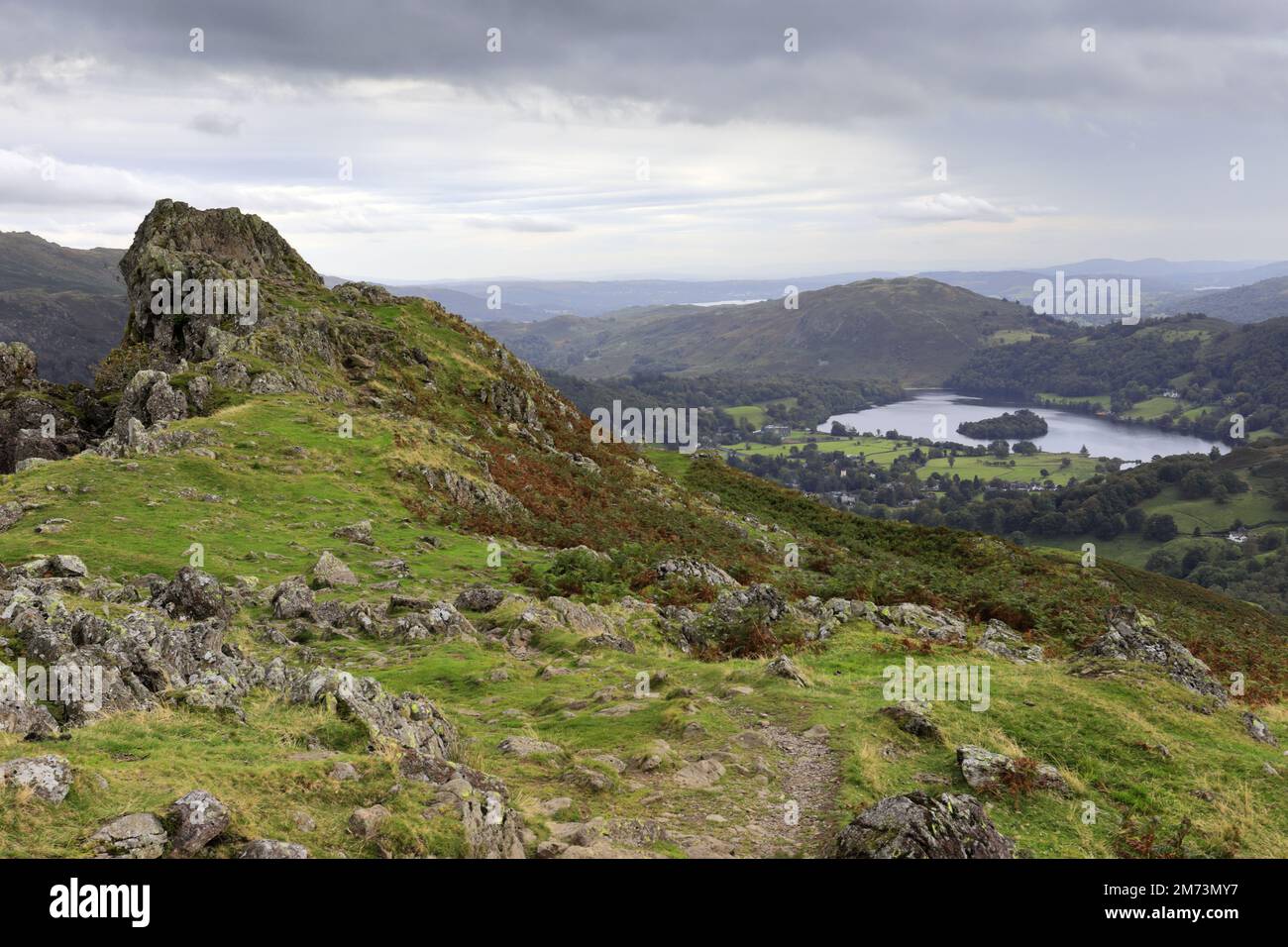 The summit of Helm Crag fell, above Grasmere in the Central Fells, Lake ...
