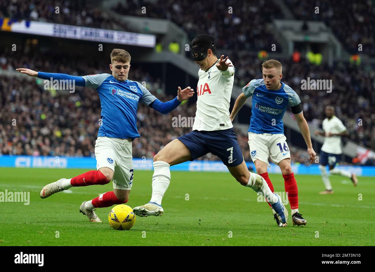 Tottenham Hotspur's Son Heung-min and Portsmouth's Zak Swanson (left ...
