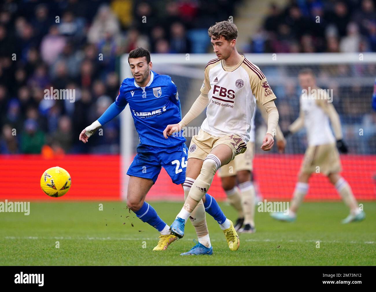 Leicester City's Lewis Brunt and Gillingham's Scott Kashket (left ...