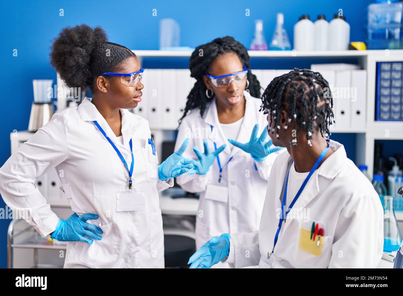 African american friends scientists speaking at laboratory Stock Photo ...