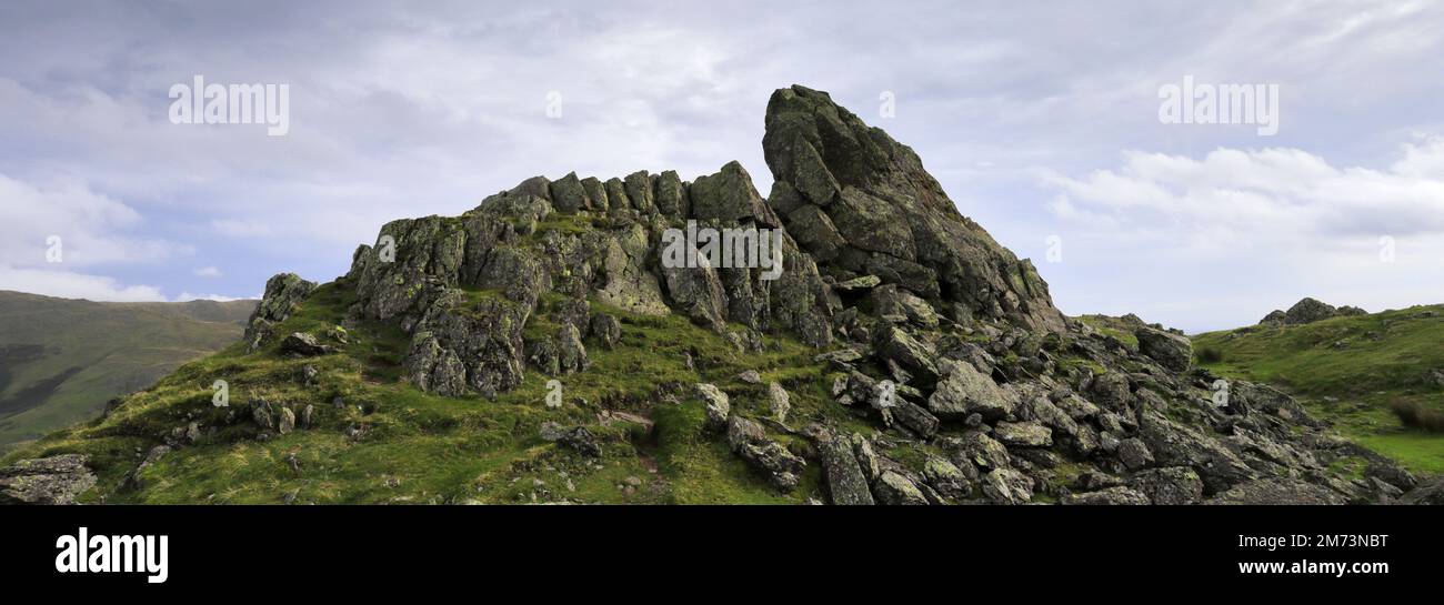 The summit of Helm Crag fell, above Grasmere in the Central Fells, Lake ...