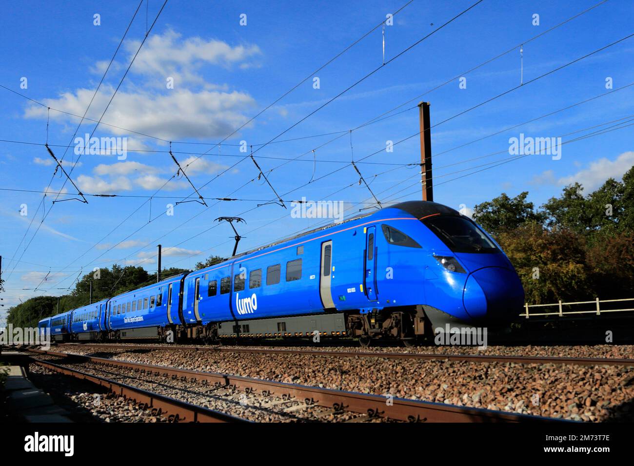 Lumo trains 803003 train, East Coast Main Line near Grantham town ...