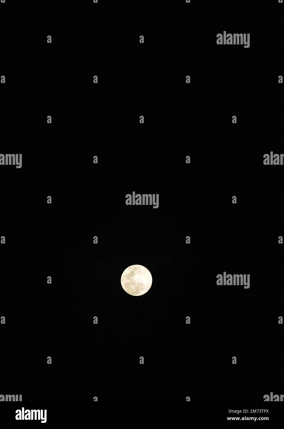 full moon cover by spreading cloud in night Stock Photo - Alamy