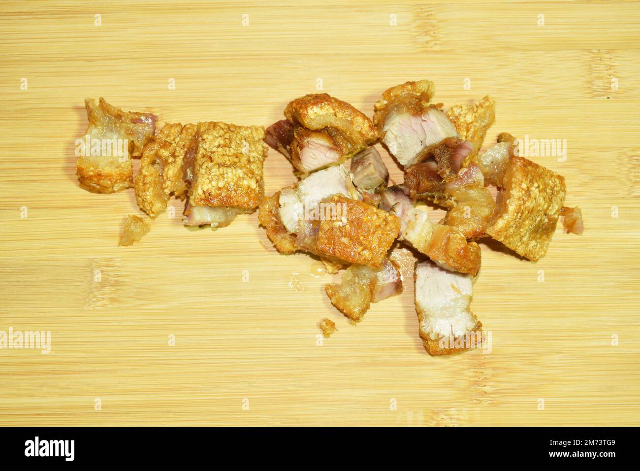 slice crispy pork on wooden chop block Stock Photo - Alamy