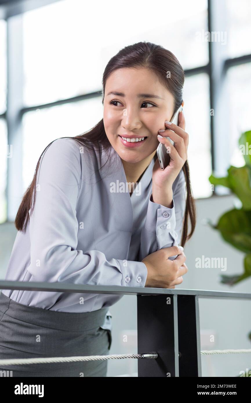 Business people make a phone call Stock Photo - Alamy