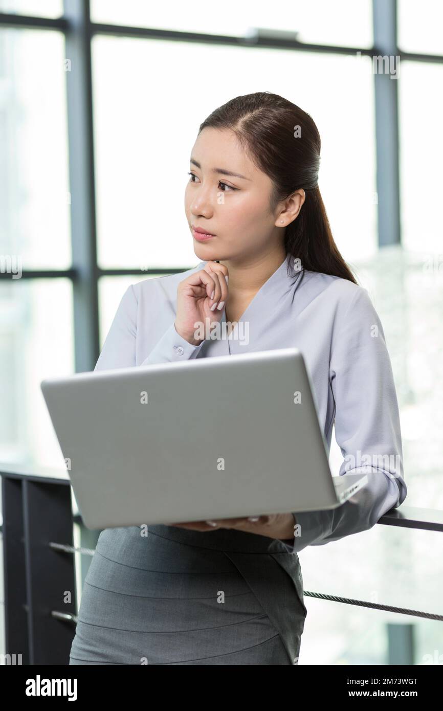 Business people use computer to surf the Internet Stock Photo - Alamy