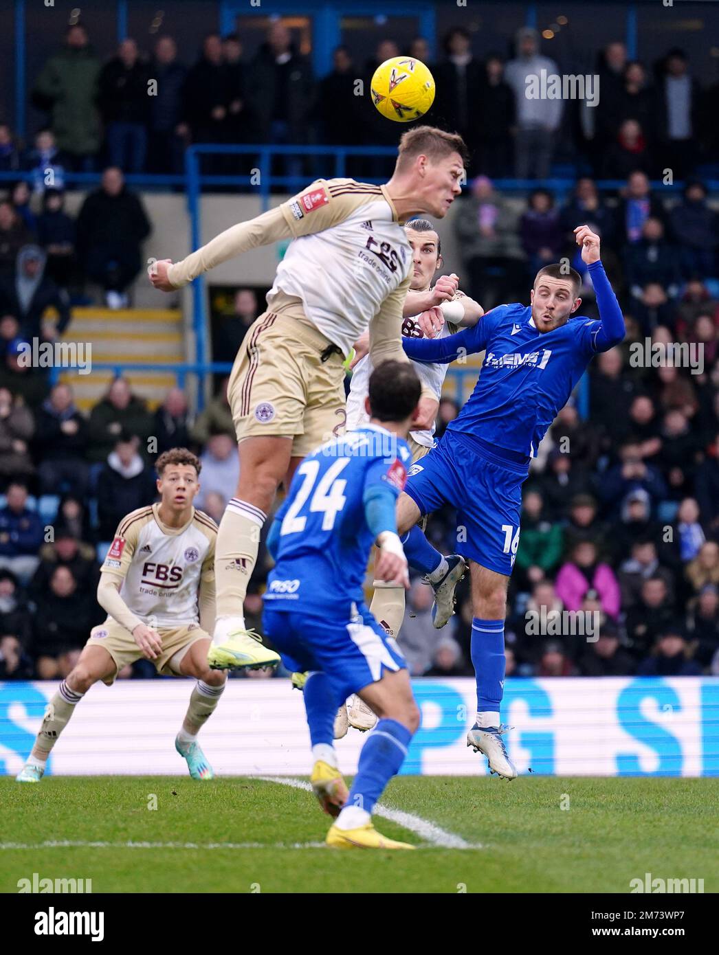 Gillingham's Dom Jefferies (right) competes for a cross during the ...