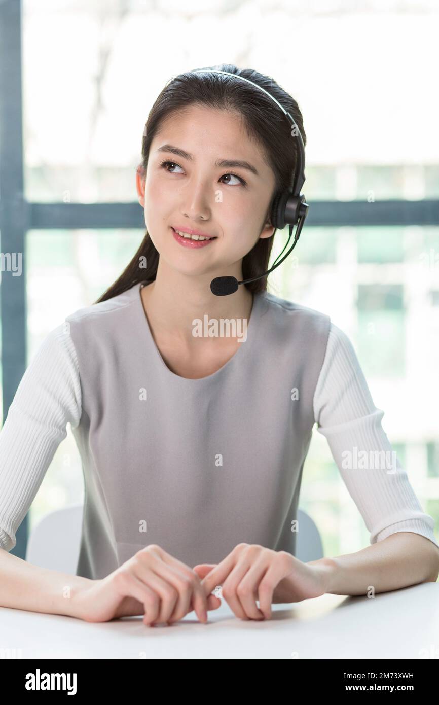 Women in answering the hotline service Stock Photo - Alamy