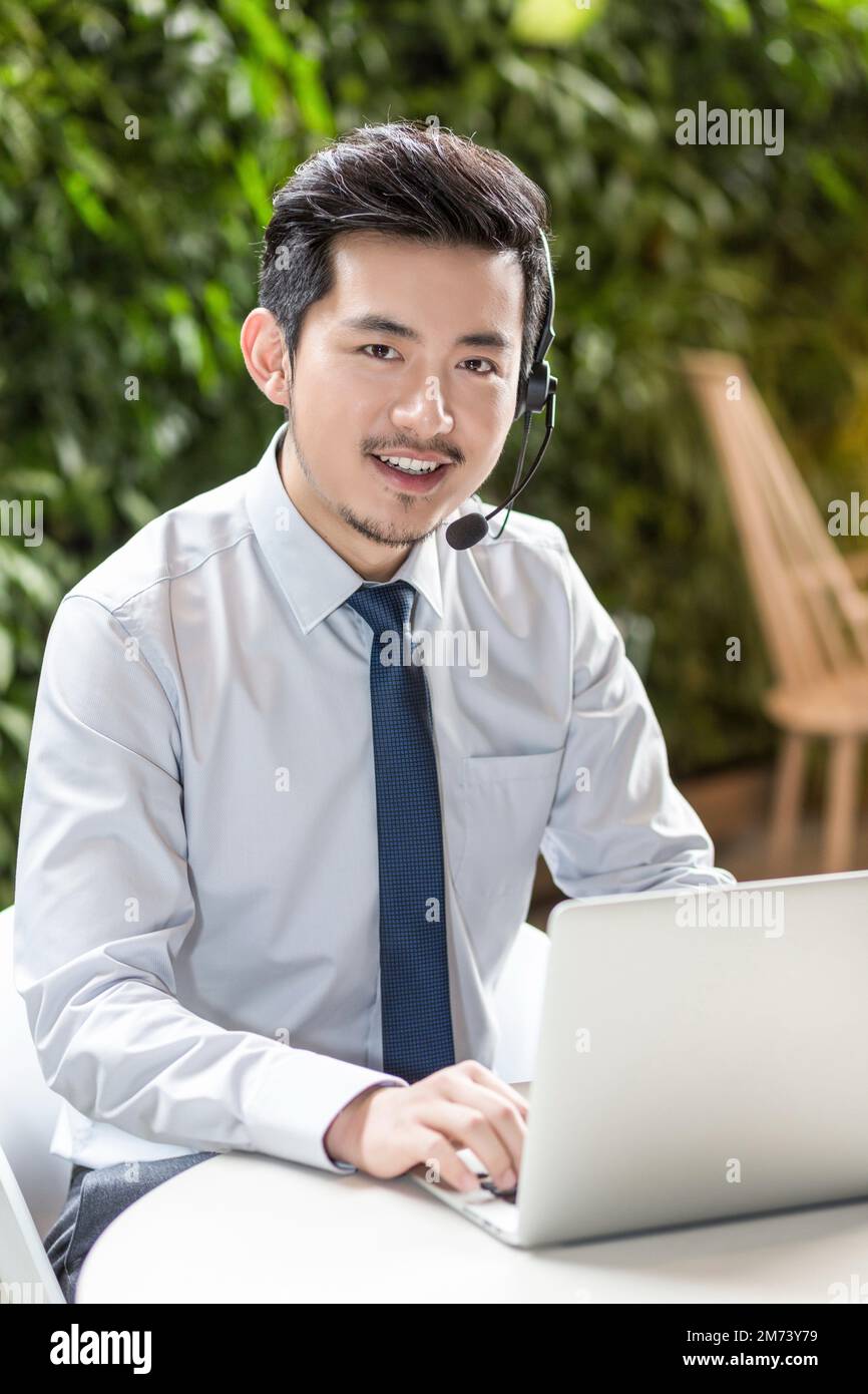 In answering the hotline service Stock Photo - Alamy