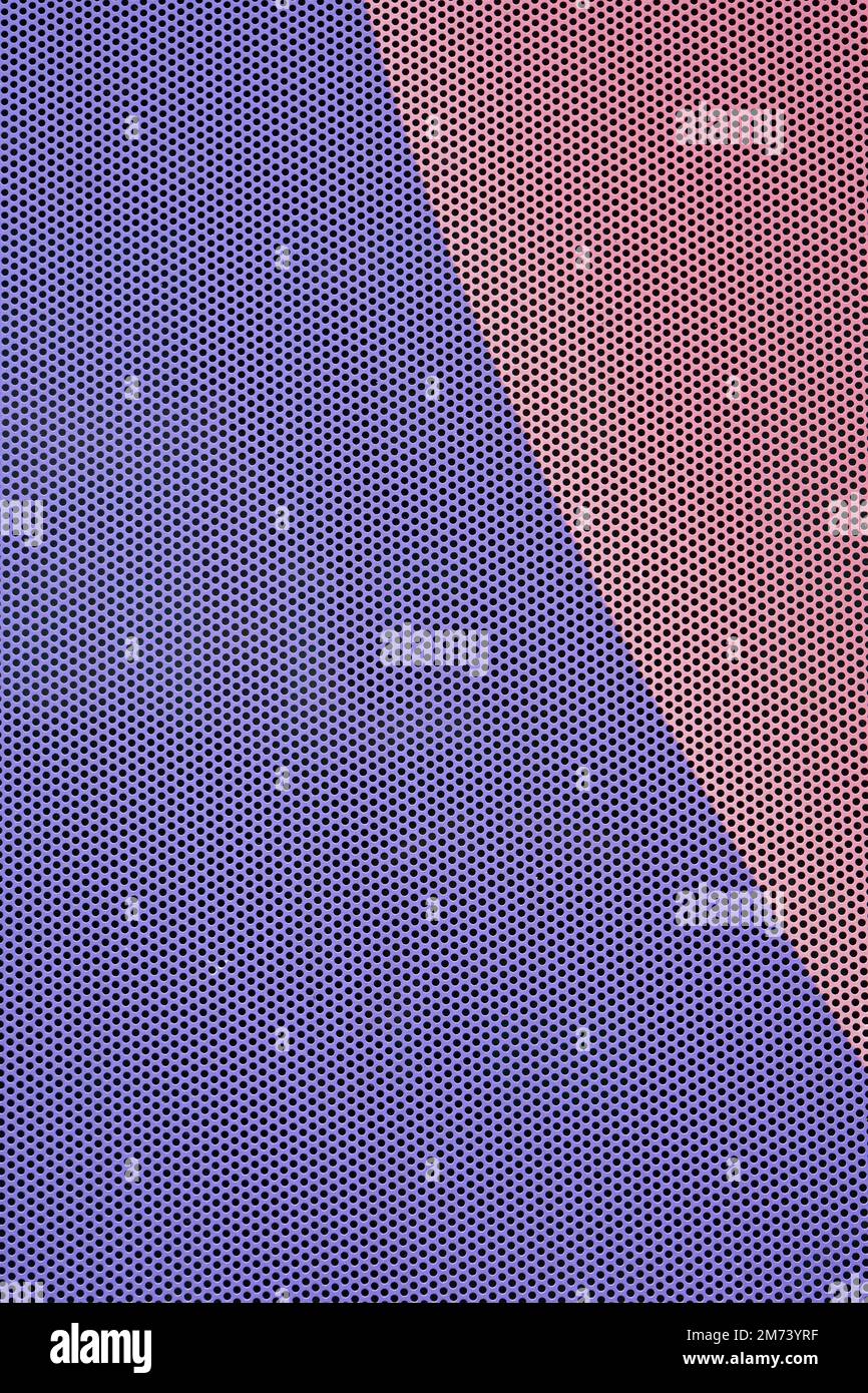 Perforated metal sheet in pink and blue colors background Stock Photo ...