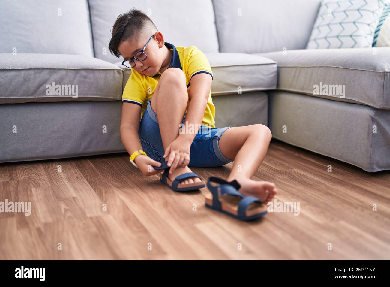 Boy wearing slippers hi-res stock photography and images - Alamy