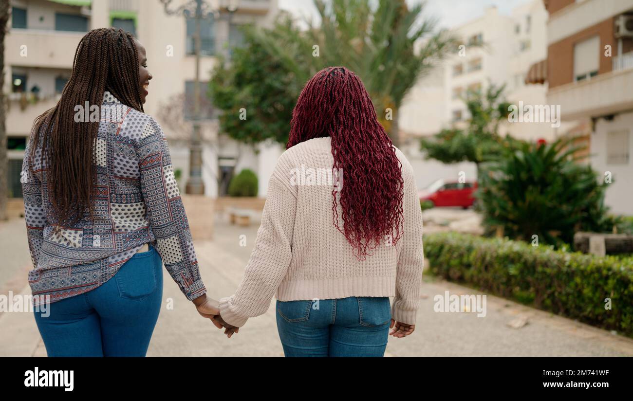 Back view woman braids walking hi-res stock photography and images - Alamy
