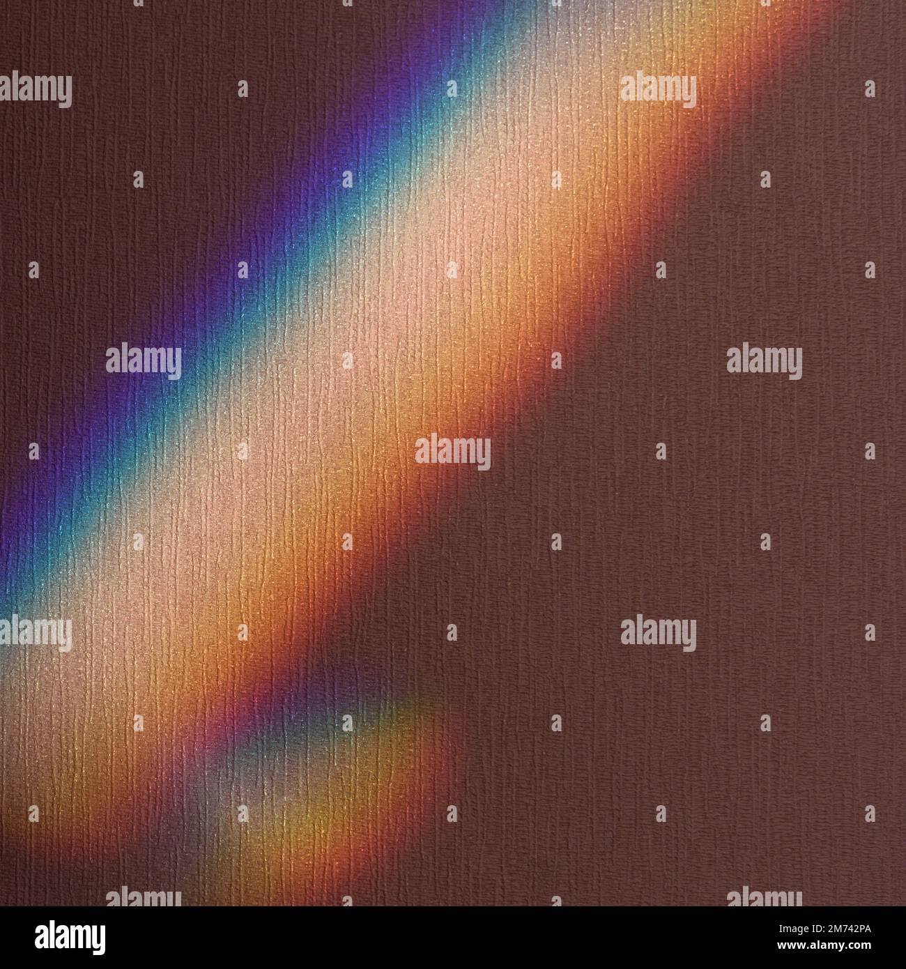 Reflected iridescent rainbow light on the wall in the apartment Stock ...