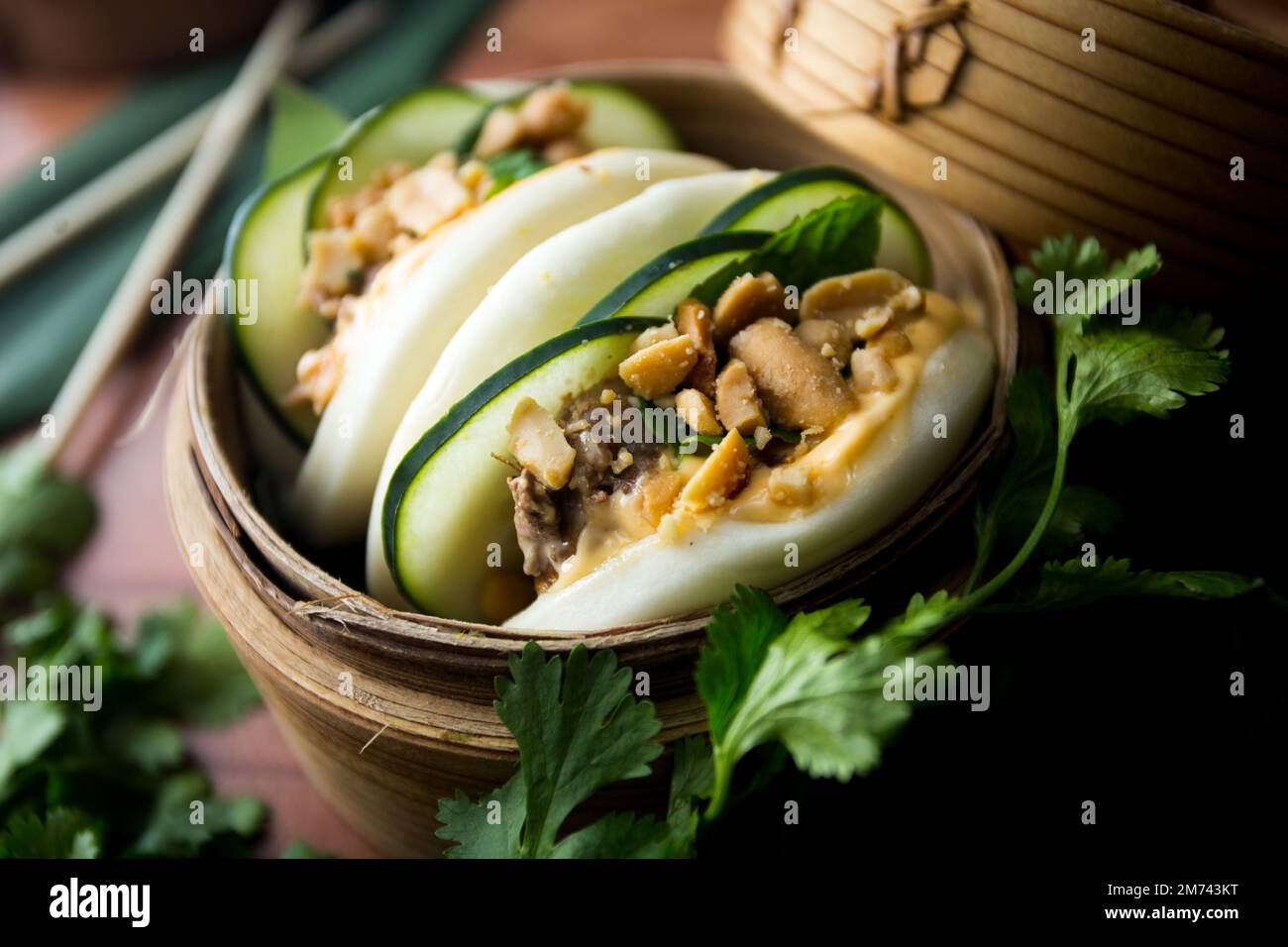 Bao with beef and cucumber Stock Photo - Alamy