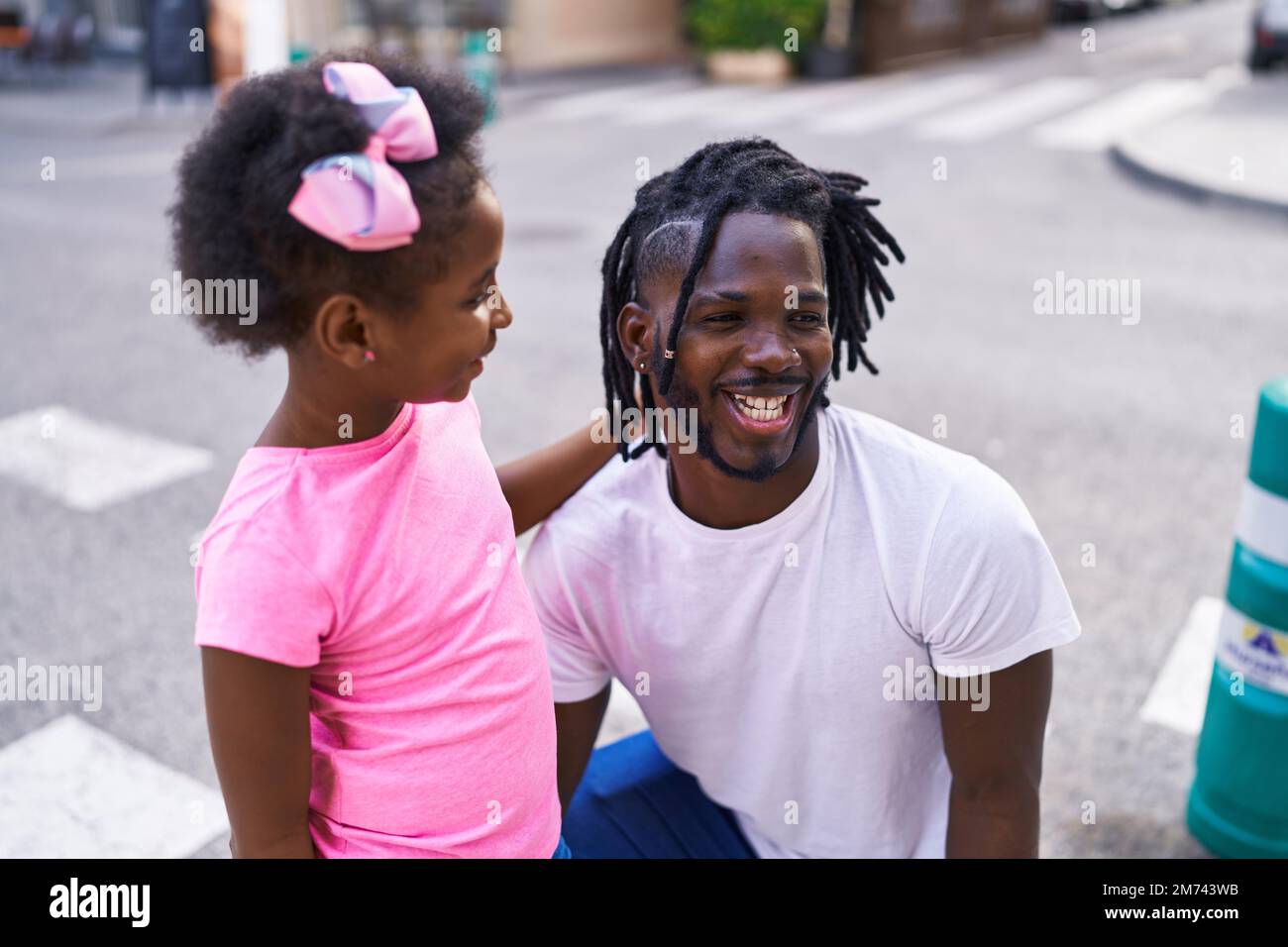 Father and daughter smiling confident standing together at street Stock ...