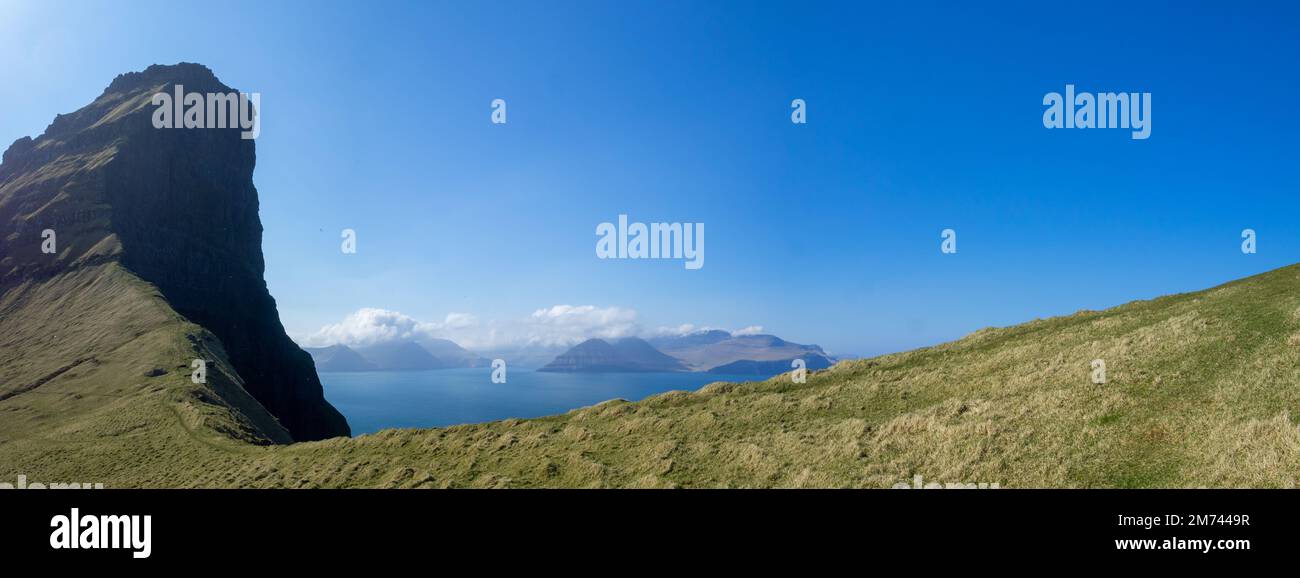 Panorama of Kallur lighthouse hiking path by the cliffs edge, in north ...