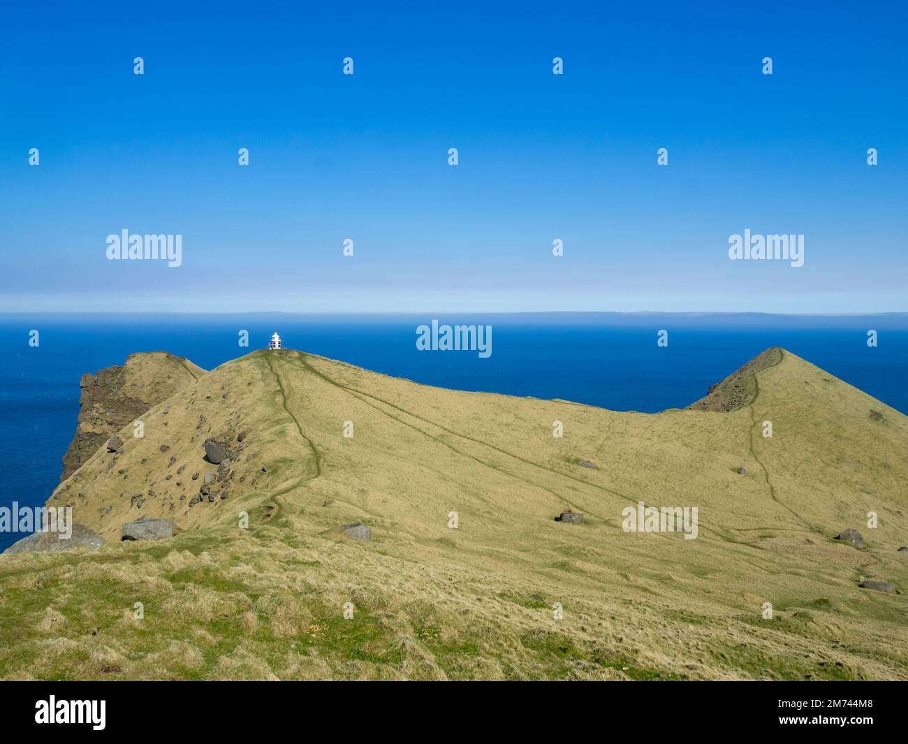 Hikking path by the cliffs edge leading to Kallur lighthouse, in north ...