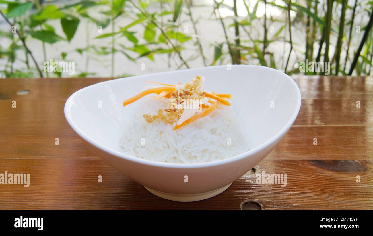 Bowl with cooked white rice Stock Photo - Alamy