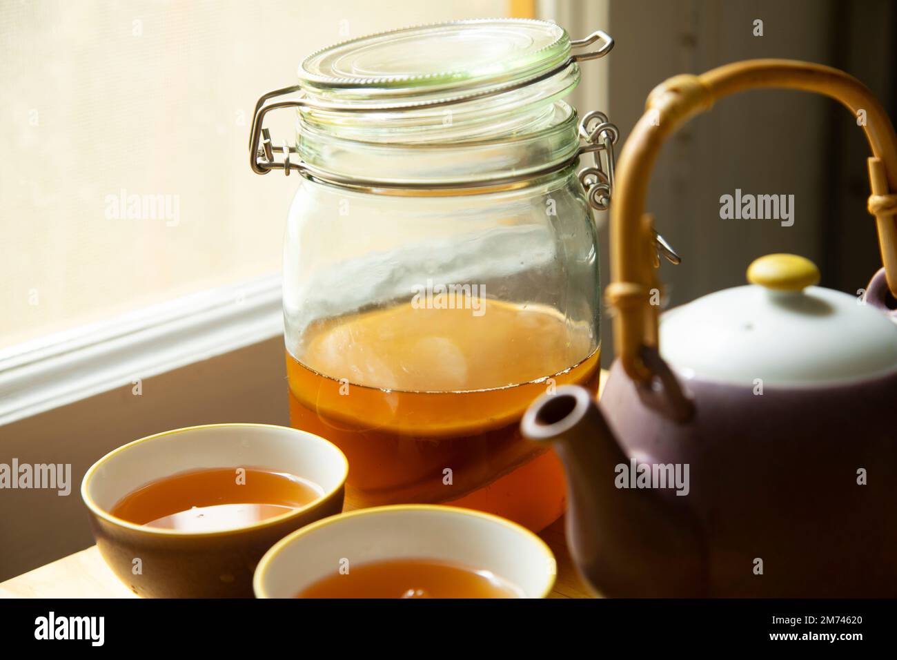 Kombucha tea. It is a sweetened, slightly effervescent, fermented black ...
