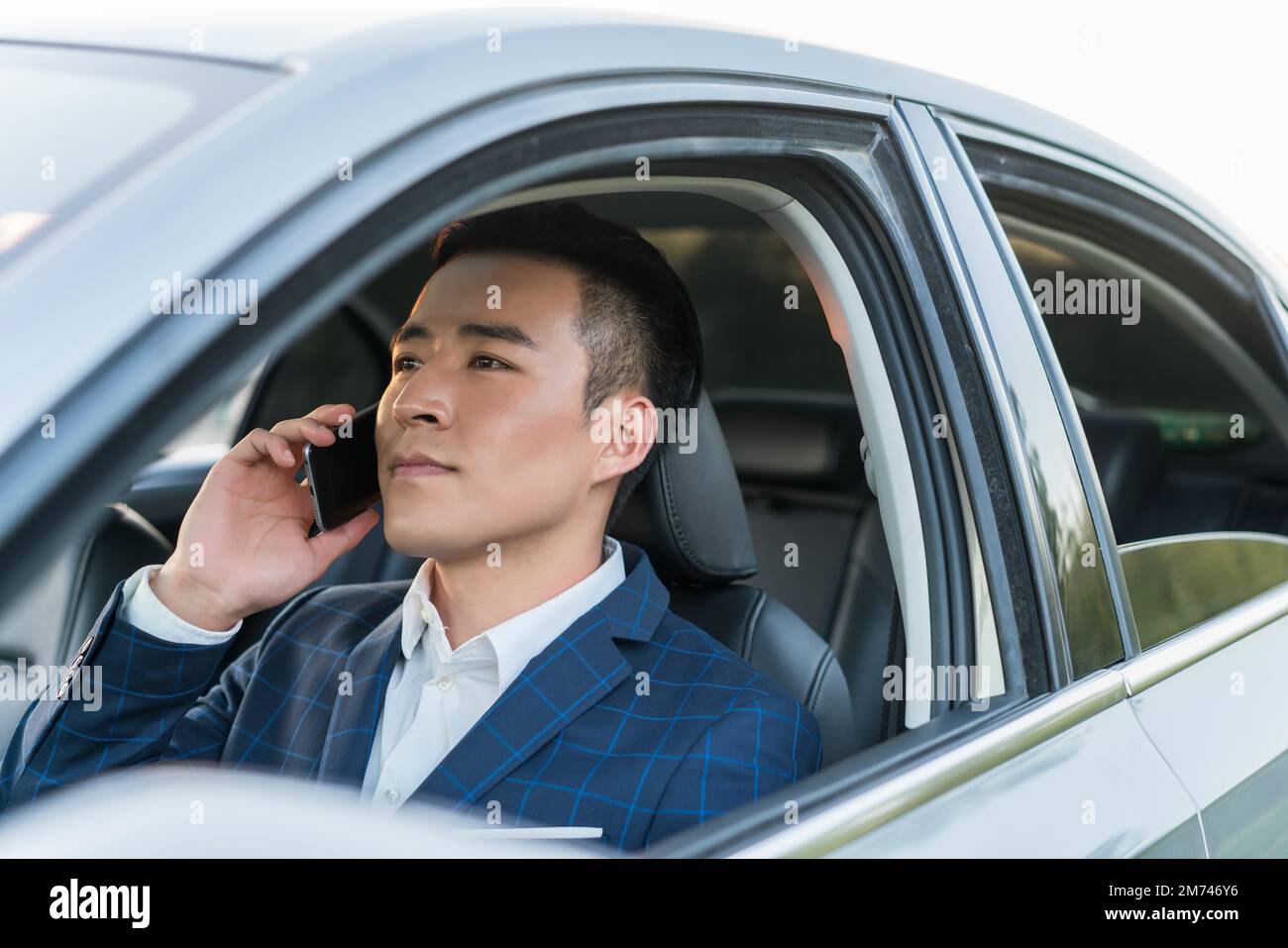 Call business man in the car Stock Photo - Alamy