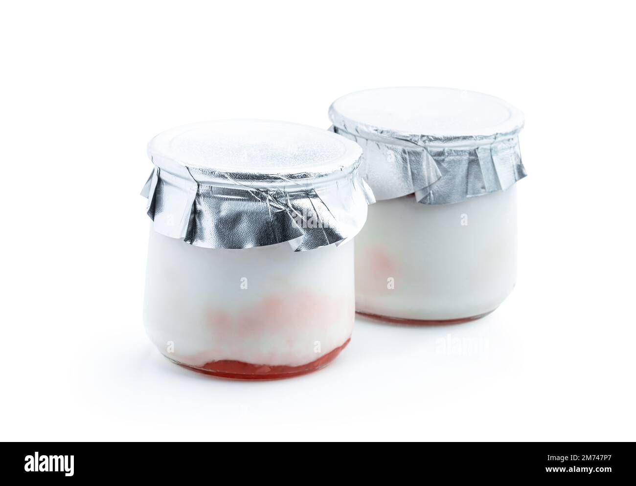 Fresh natural homemade organic yogurt in a glass jars isolated on white ...