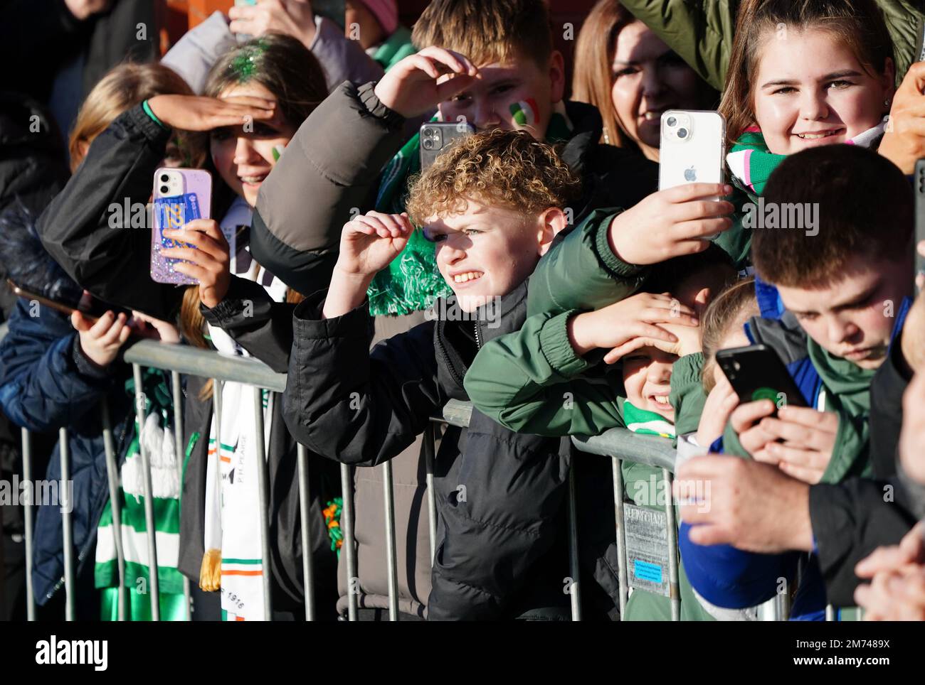 Celtic fans wait for the team bus to arrive outside the ground before ...