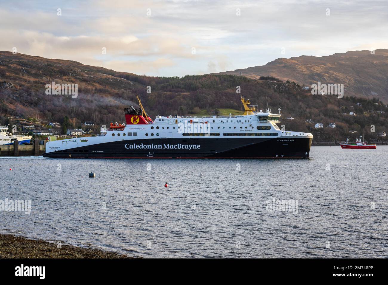 CalMac ferry MV Loch Seaforth departing Ullapool ferry terminal ...