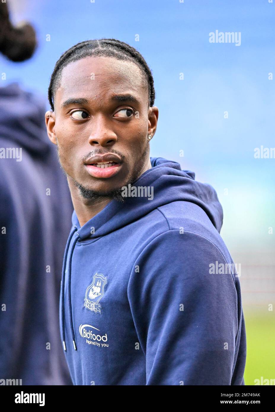 Plymouth Argyle midfielder Jay Matete (28) walks on and inspect the ...