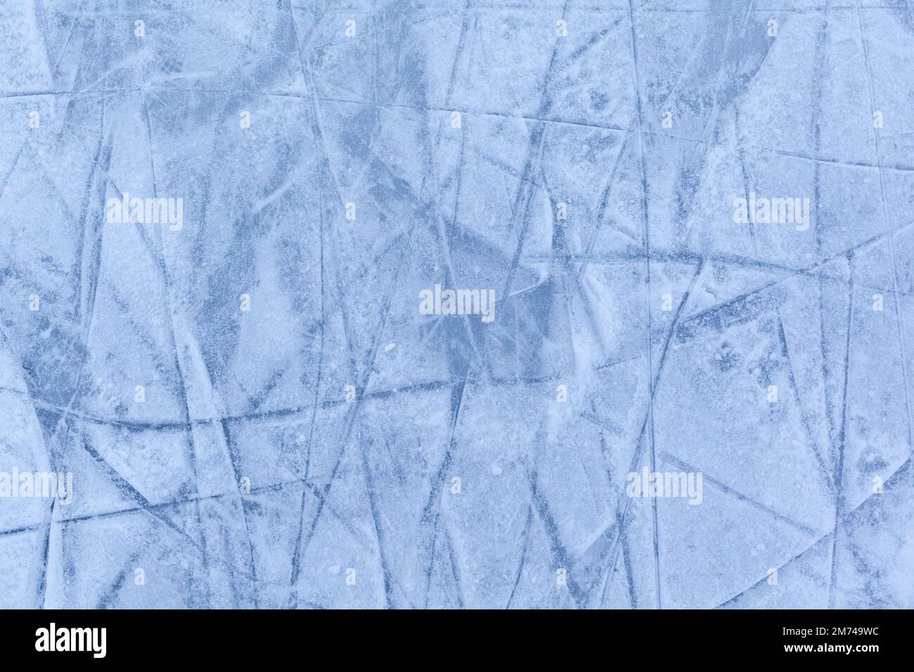 Empty ice rink with skate marks after the session outdoor. skating ice ...