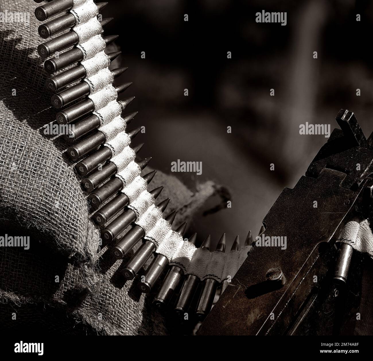 Belts of linked amunition for machine gun Stock Photo - Alamy
