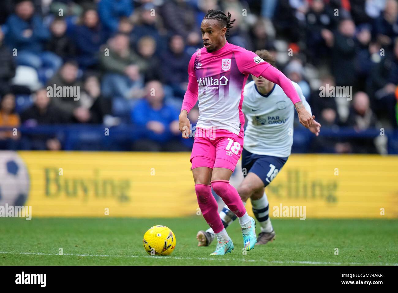 David Kasumu #18 of Huddersfield Town makes a break during the Emirates ...