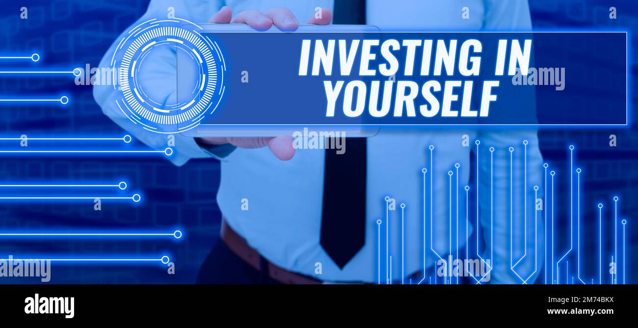 Hand writing sign Investing In Yourself. Concept meaning Learning new ...