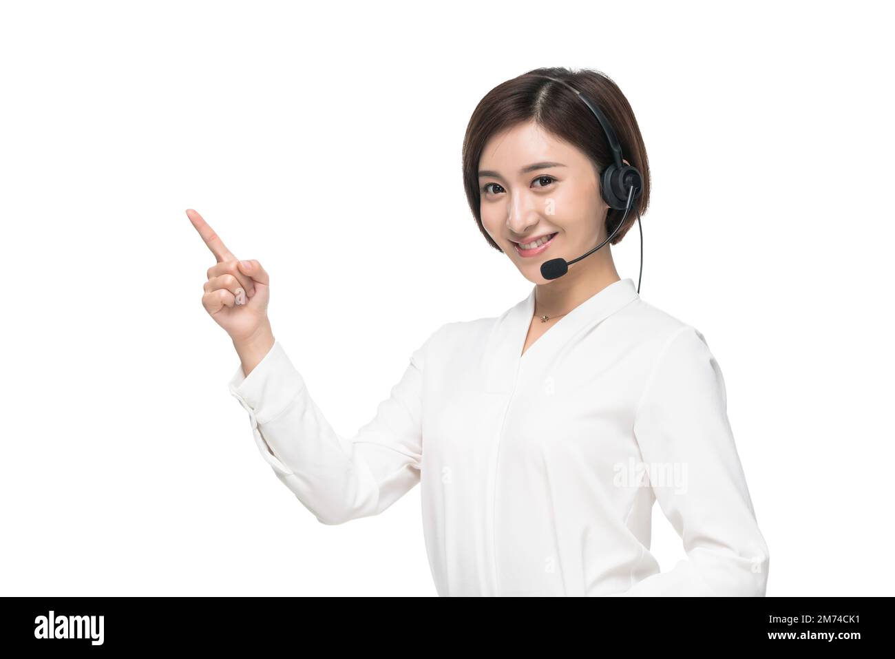 The female customer service staff wearing headphones Stock Photo - Alamy