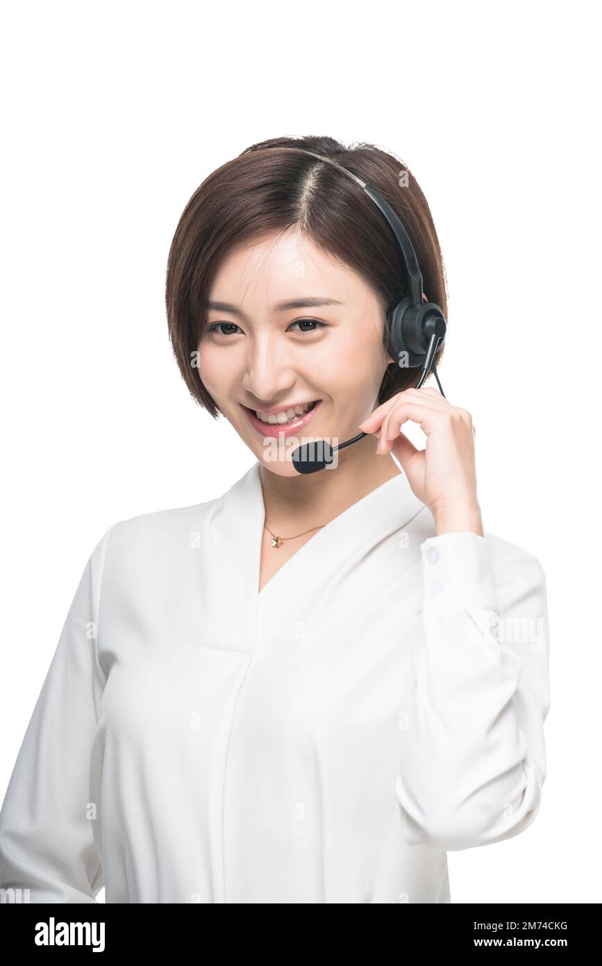 The female customer service staff wearing headphones Stock Photo - Alamy