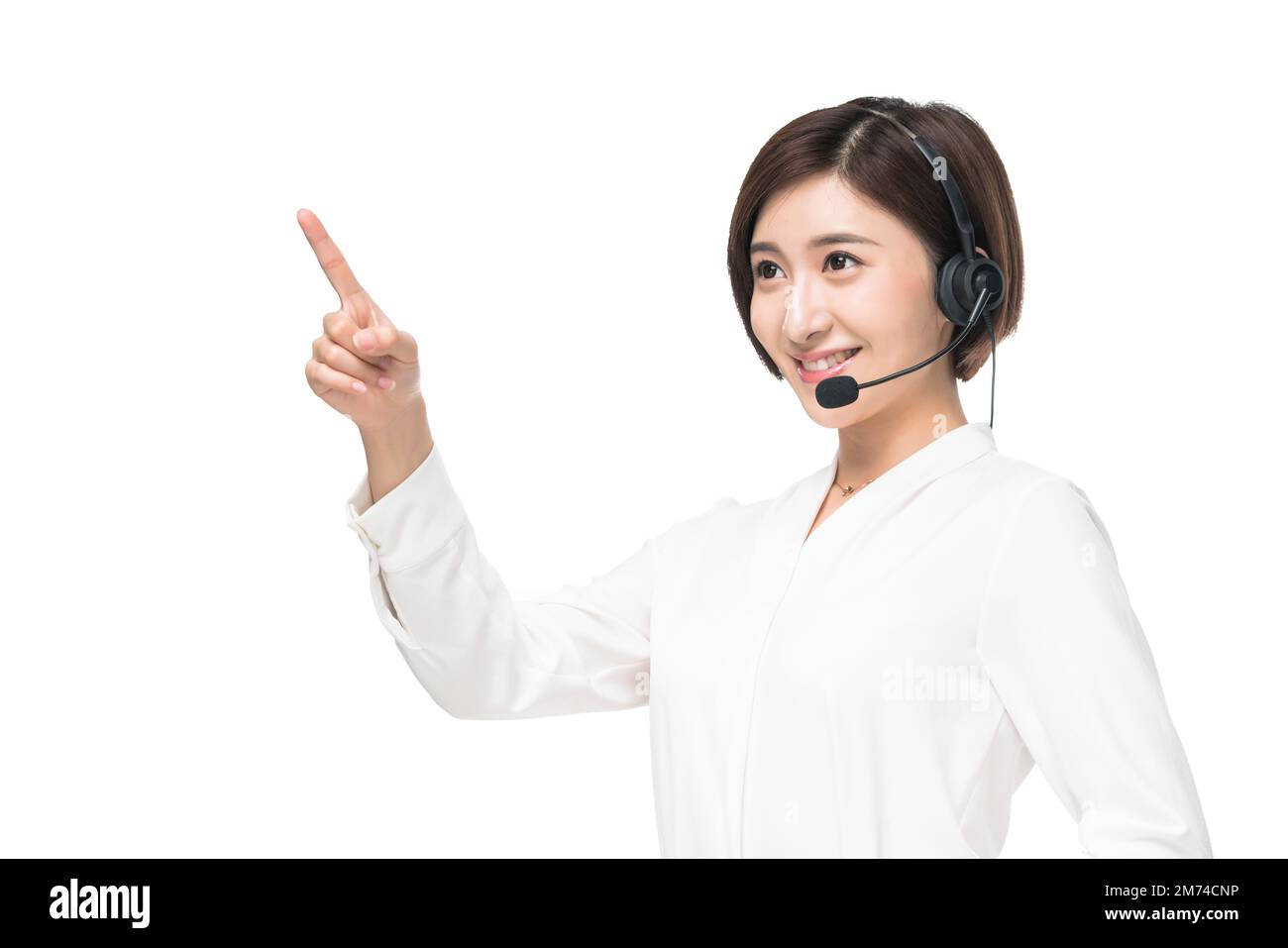 The female customer service staff wearing headphones Stock Photo - Alamy