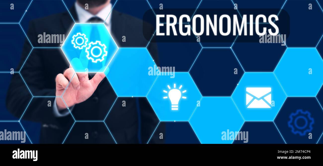 Hand writing sign Ergonomics. Concept meaning fitting or designing a ...