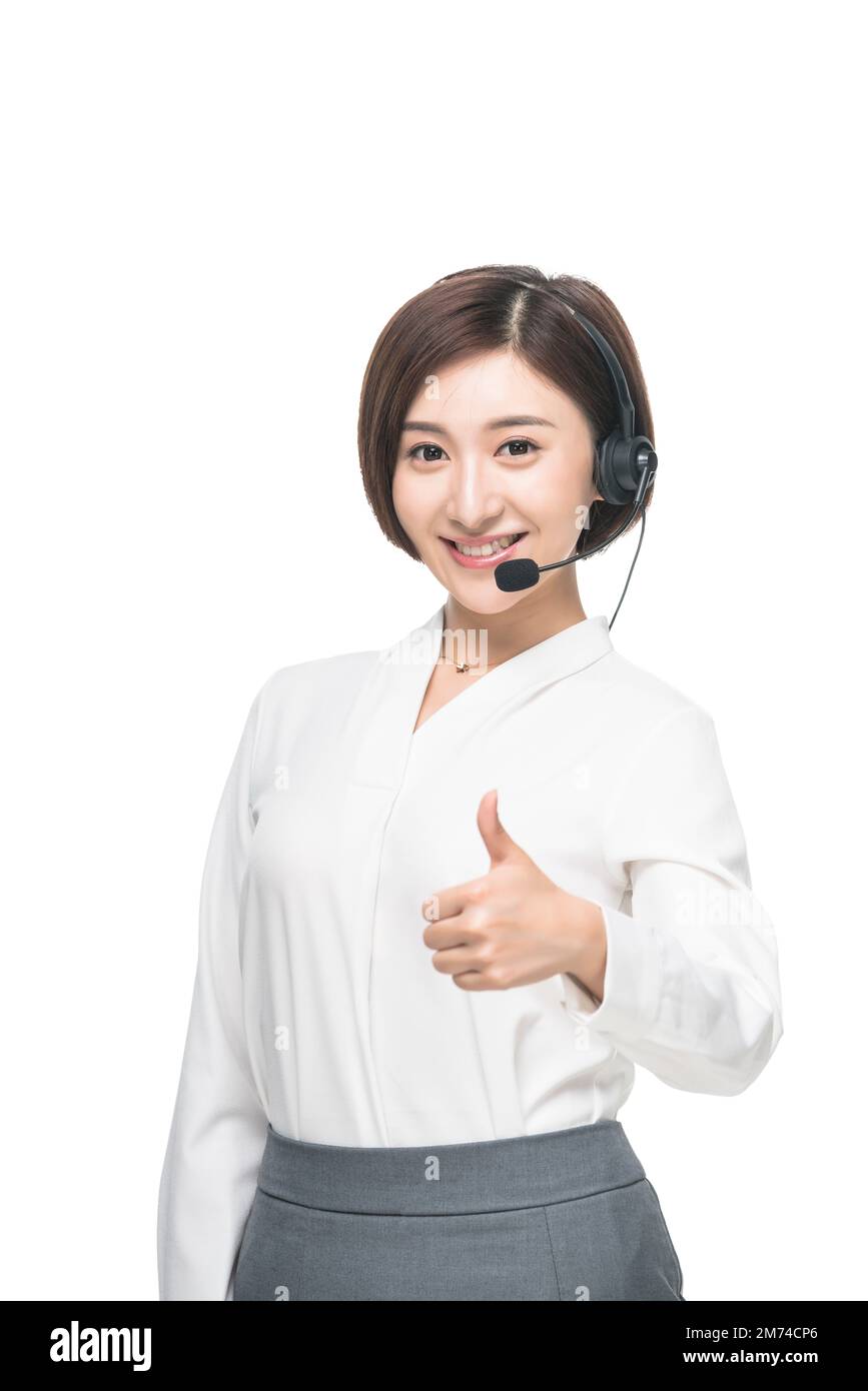 The female customer service staff wearing headphones Stock Photo - Alamy