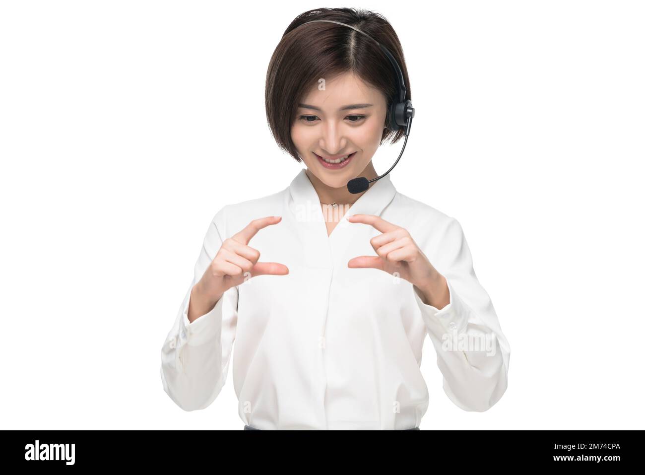 The female customer service staff wearing headphones Stock Photo - Alamy