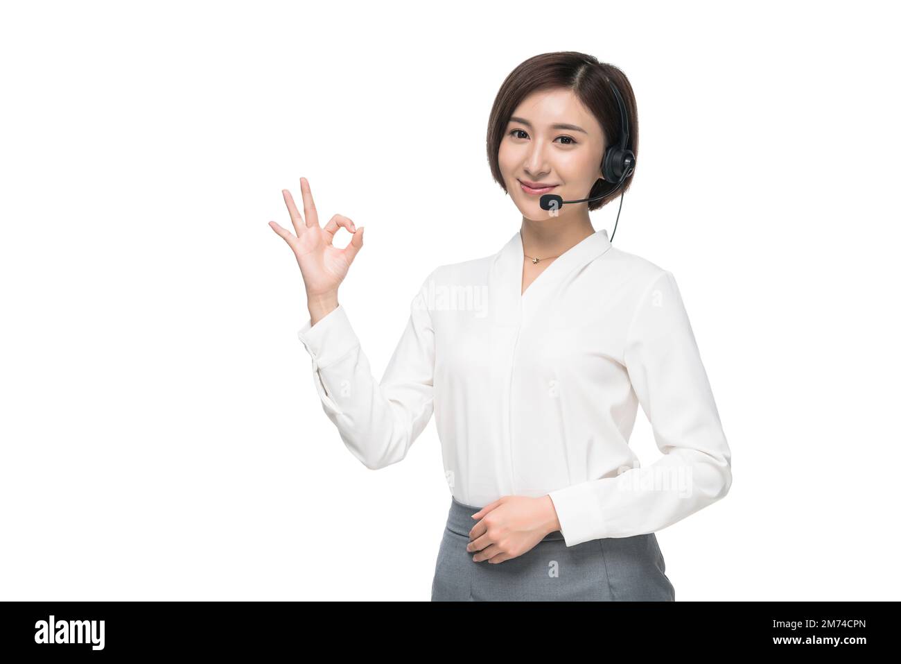 The female customer service staff wearing headphones Stock Photo - Alamy