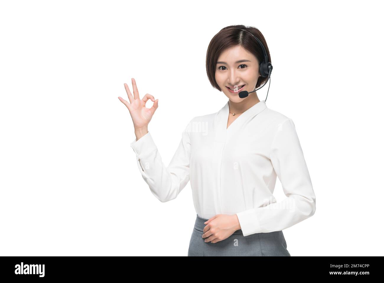 The female customer service staff wearing headphones Stock Photo - Alamy