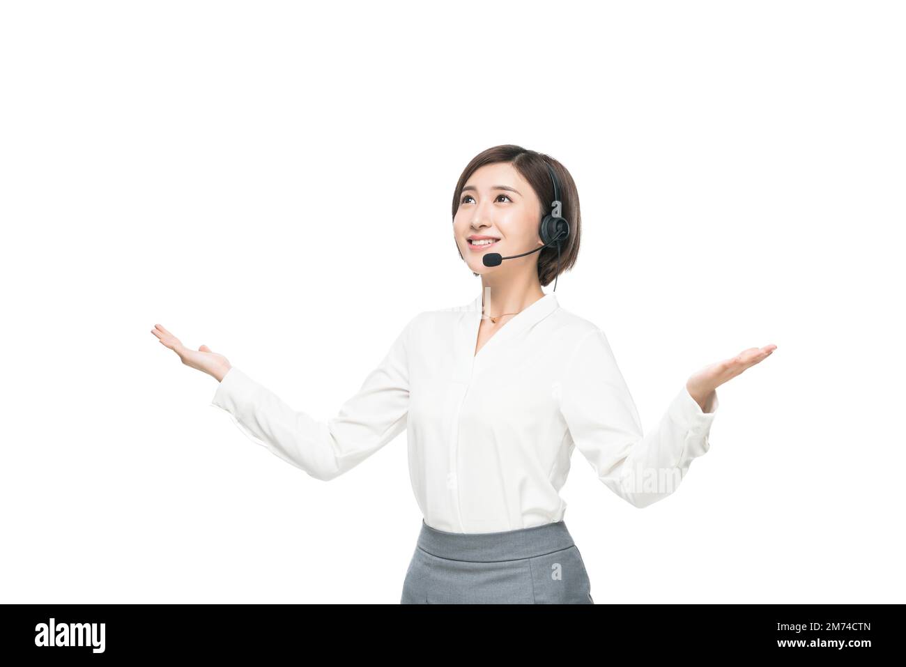 The female customer service staff wearing headphones Stock Photo - Alamy