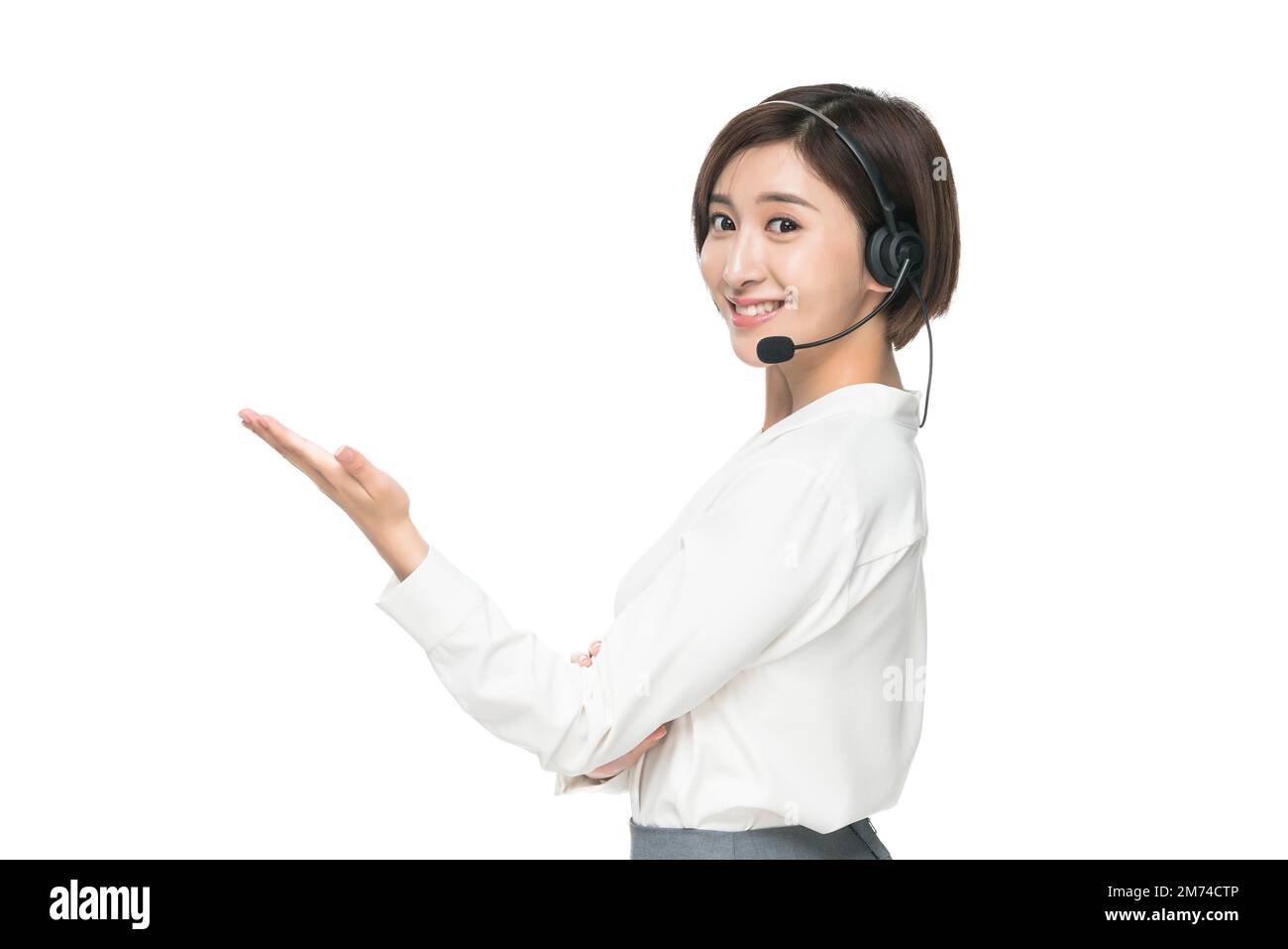 The female customer service staff wearing headphones Stock Photo - Alamy