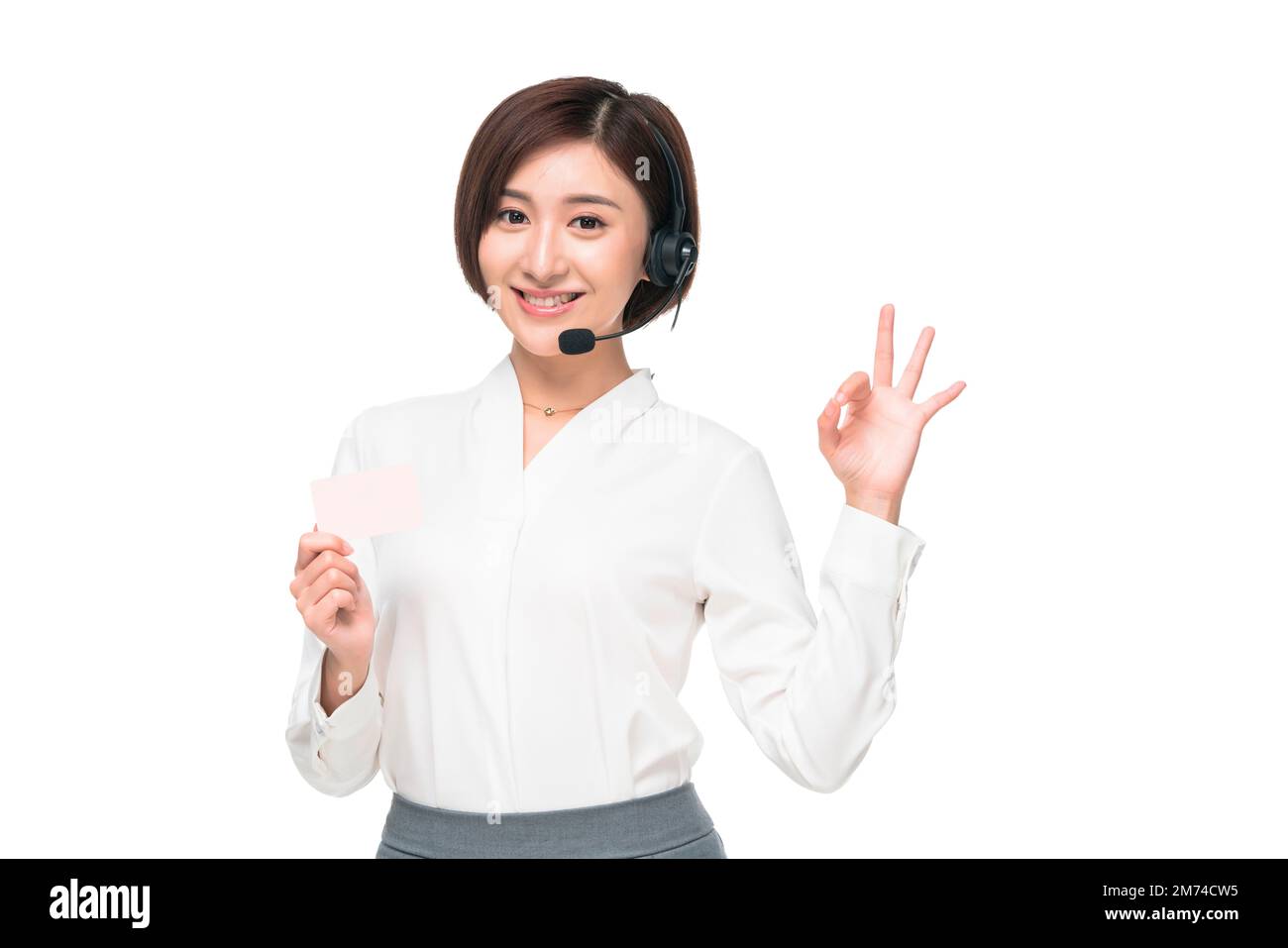 The female customer service staff wearing headphones Stock Photo - Alamy