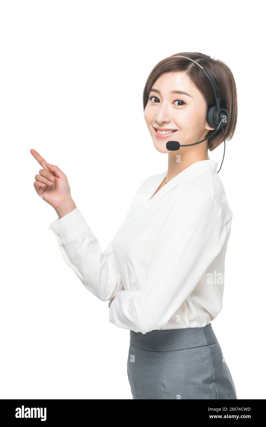 The female customer service staff wearing headphones Stock Photo - Alamy