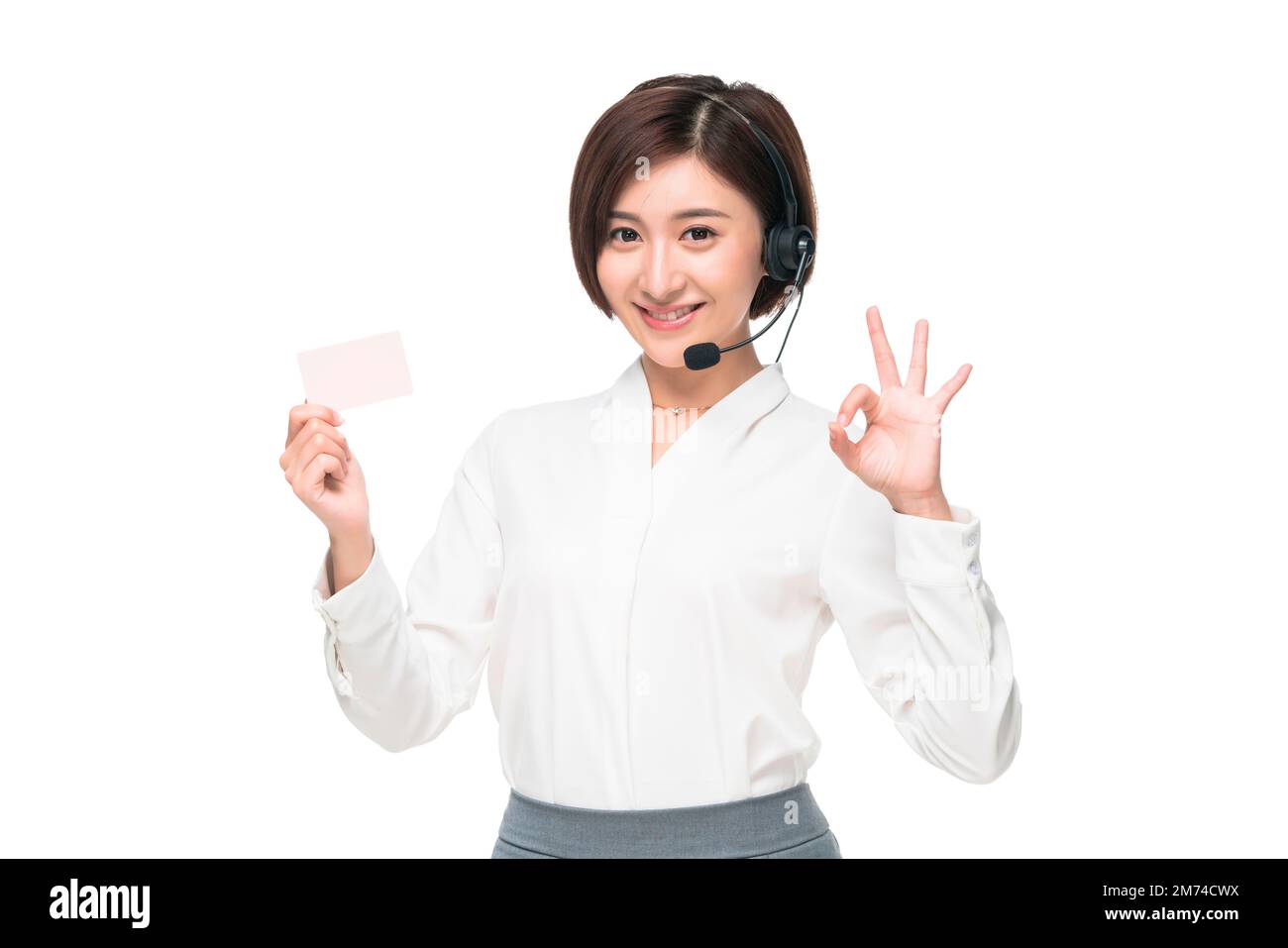 The female customer service staff wearing headphones Stock Photo - Alamy