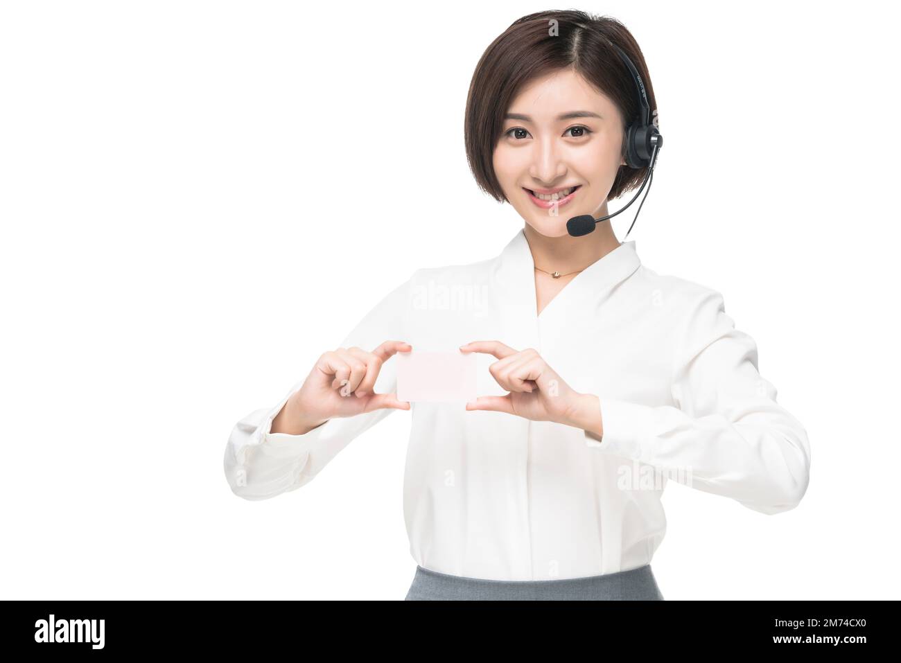 The female customer service staff wearing headphones Stock Photo - Alamy