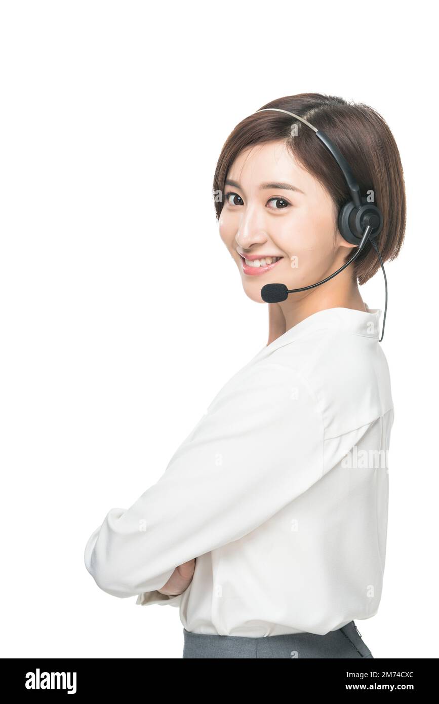 The female customer service staff wearing headphones Stock Photo - Alamy