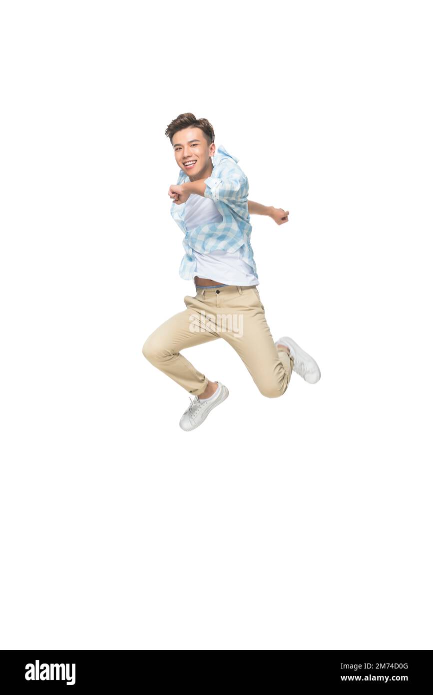 The young man jumps Stock Photo - Alamy