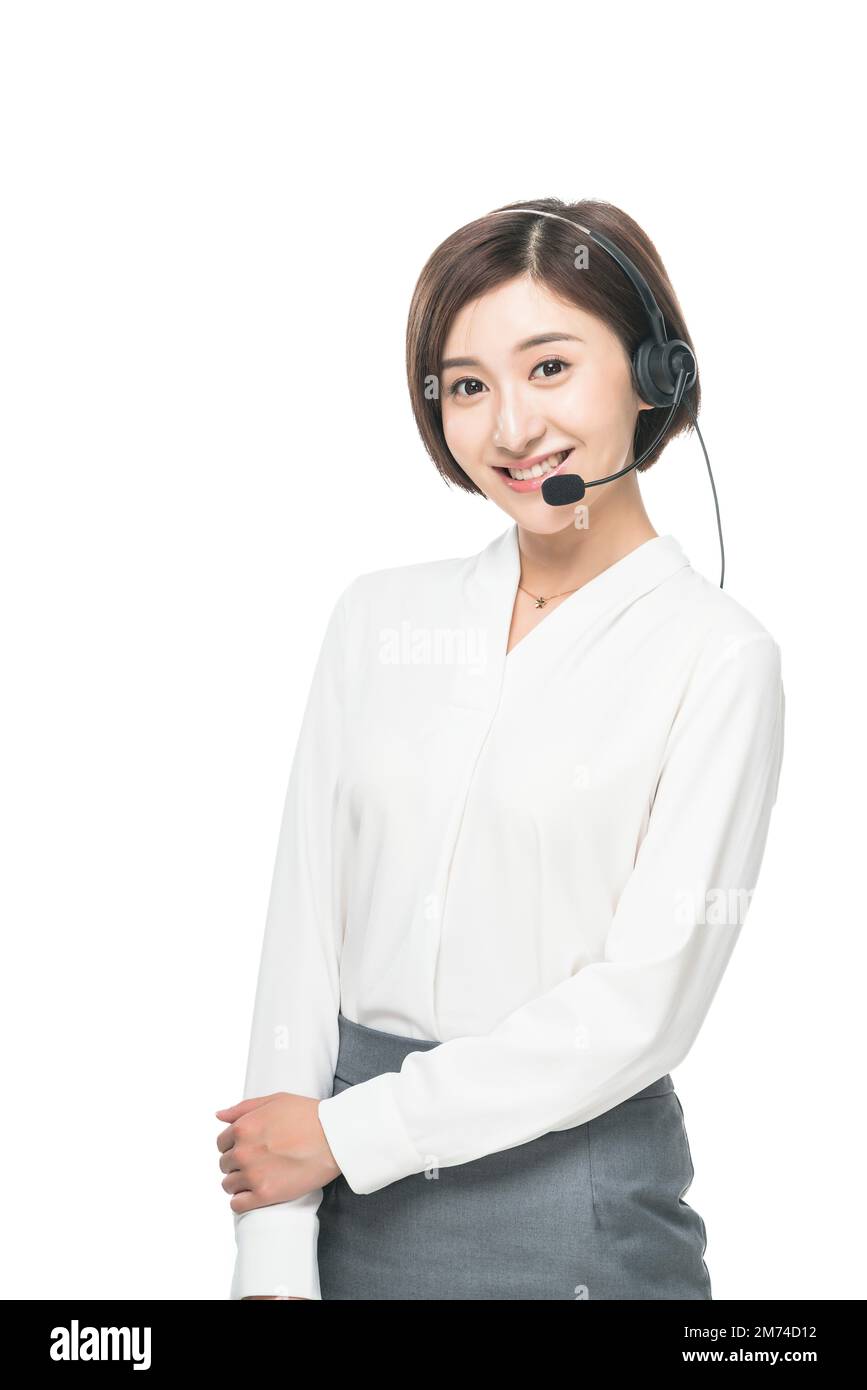 The female customer service staff wearing headphones Stock Photo - Alamy