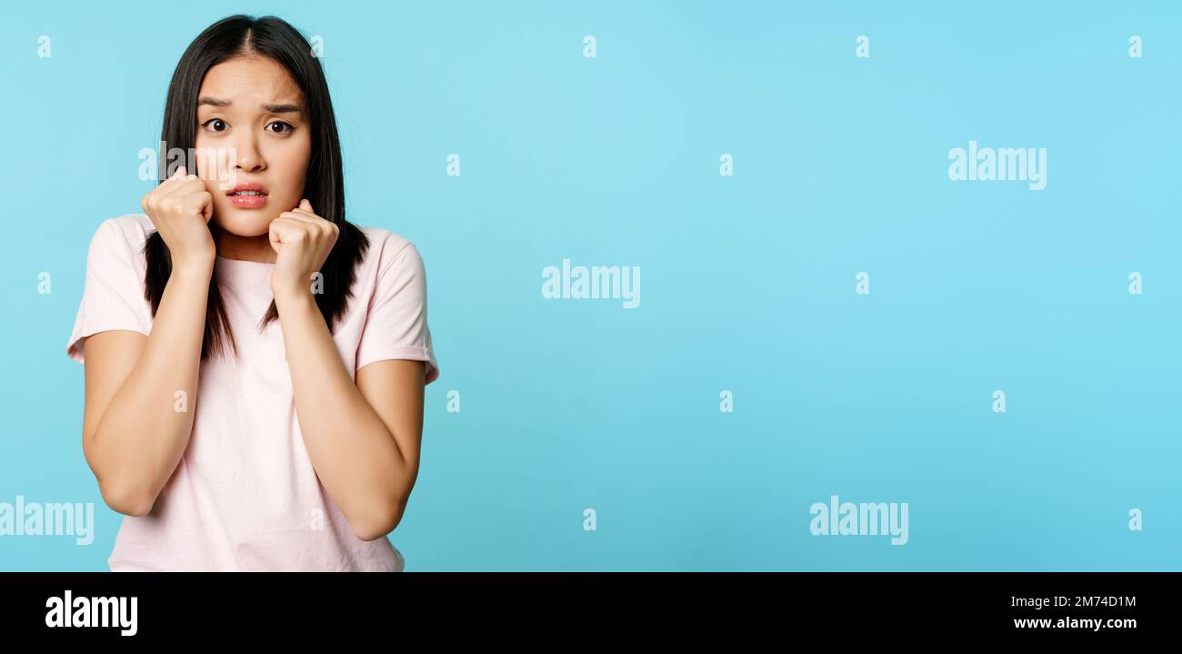 Violance, abuse victim concept. Scared timid asian woman shaking in ...